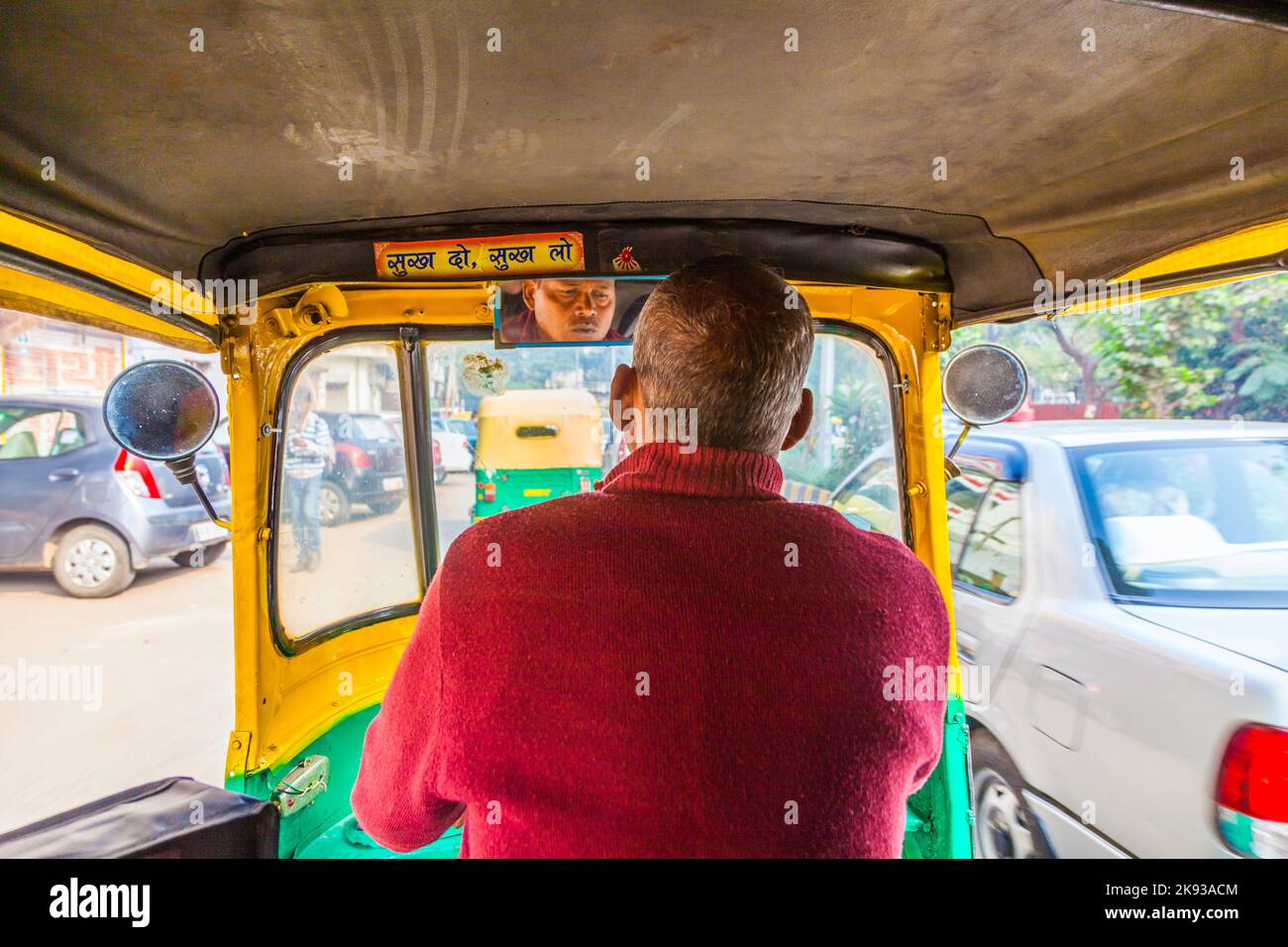 DELHI, INDIA - NOV 11, 2011: Auto rickshaw taxi driver in Delhi, India ...