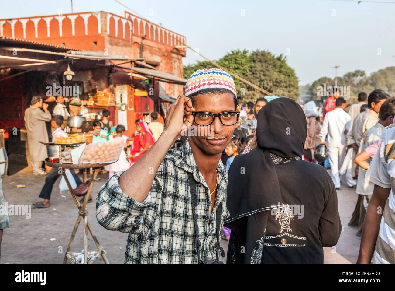 DELHI - NOV 8, 2011: portrait of young man with modern glasses at the ...