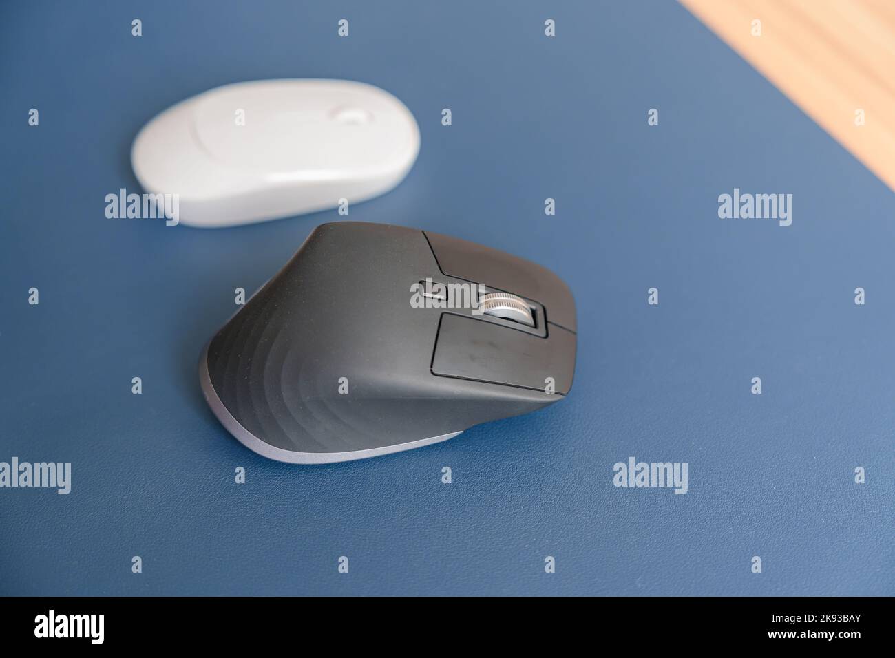 Comparison of Ergonomic vertical mouse and general mouse on desk at ...