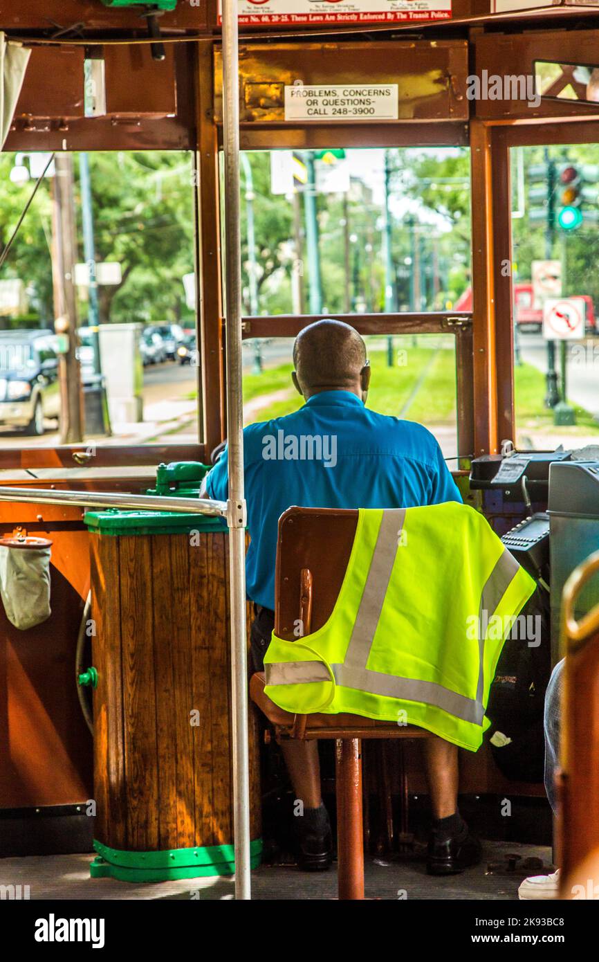 NEW ORLEANS - JULY 16, 2013: conductor in the famous old Street car St ...
