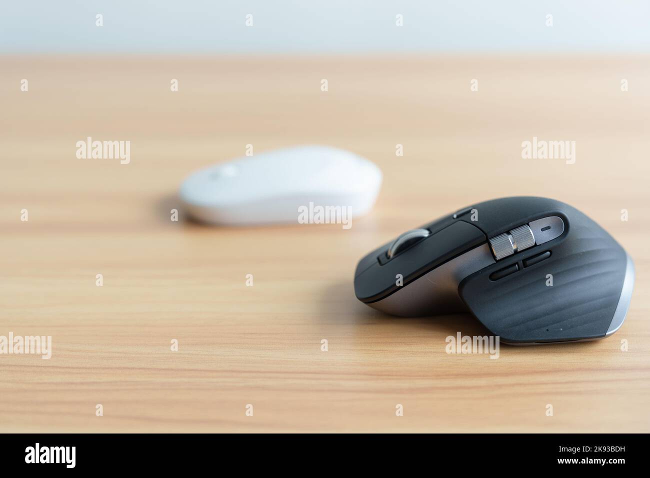 Comparison of Ergonomic vertical mouse and general mouse on desk at ...