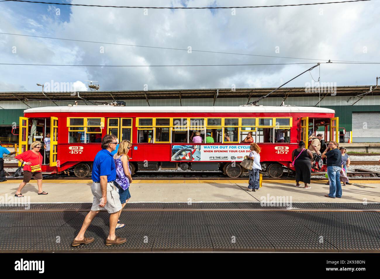 NEW ORLEANS, USA - JULY 16, 2013: people enter the riverfront Streetcar ...