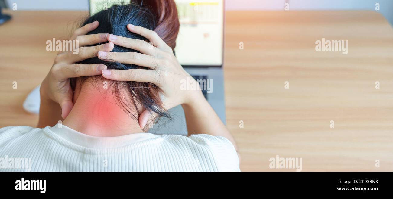 Woman having Neck and Shoulder pain during work long time on workplace ...