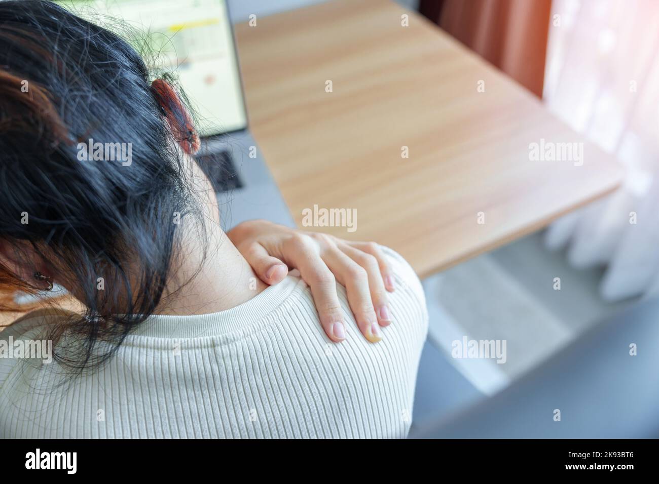 Woman having Neck and Shoulder pain during work long time on workplace ...