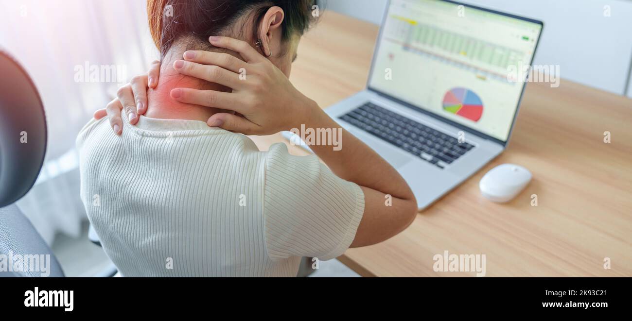 Woman having Neck and Shoulder pain during work long time on workplace ...
