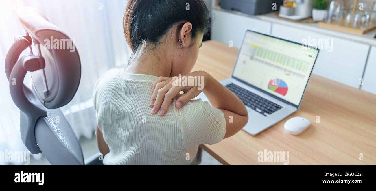 Woman having Neck and Shoulder pain during work long time on workplace ...