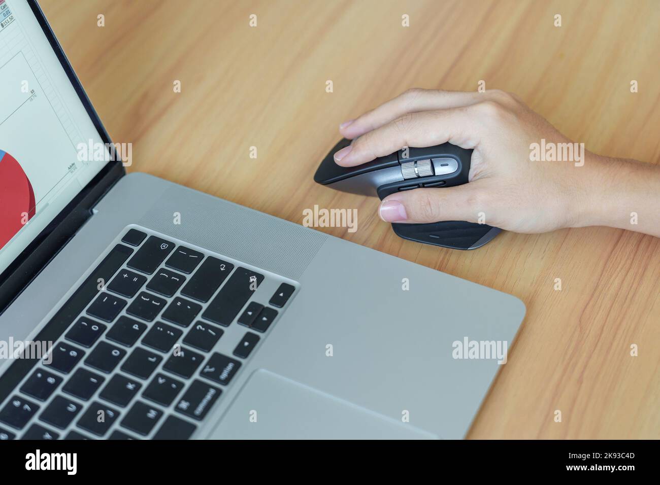 woman hand using ergonomic vertical mouse during working on Adjustable ...