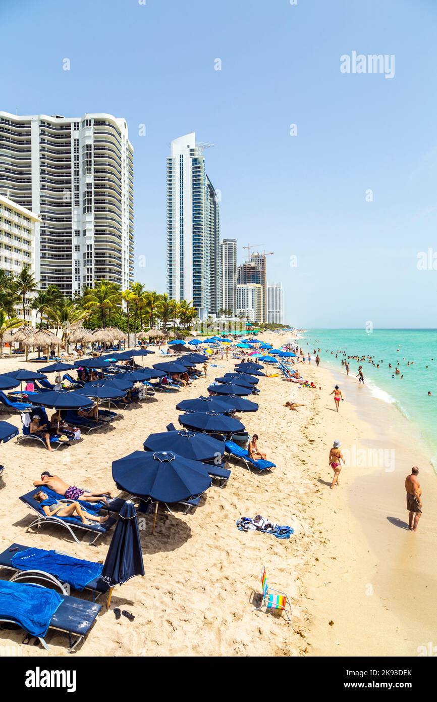 SUNNY ISLES BEACH, USA - AUG 2014: people at Jade beach in Sunny Isles ...