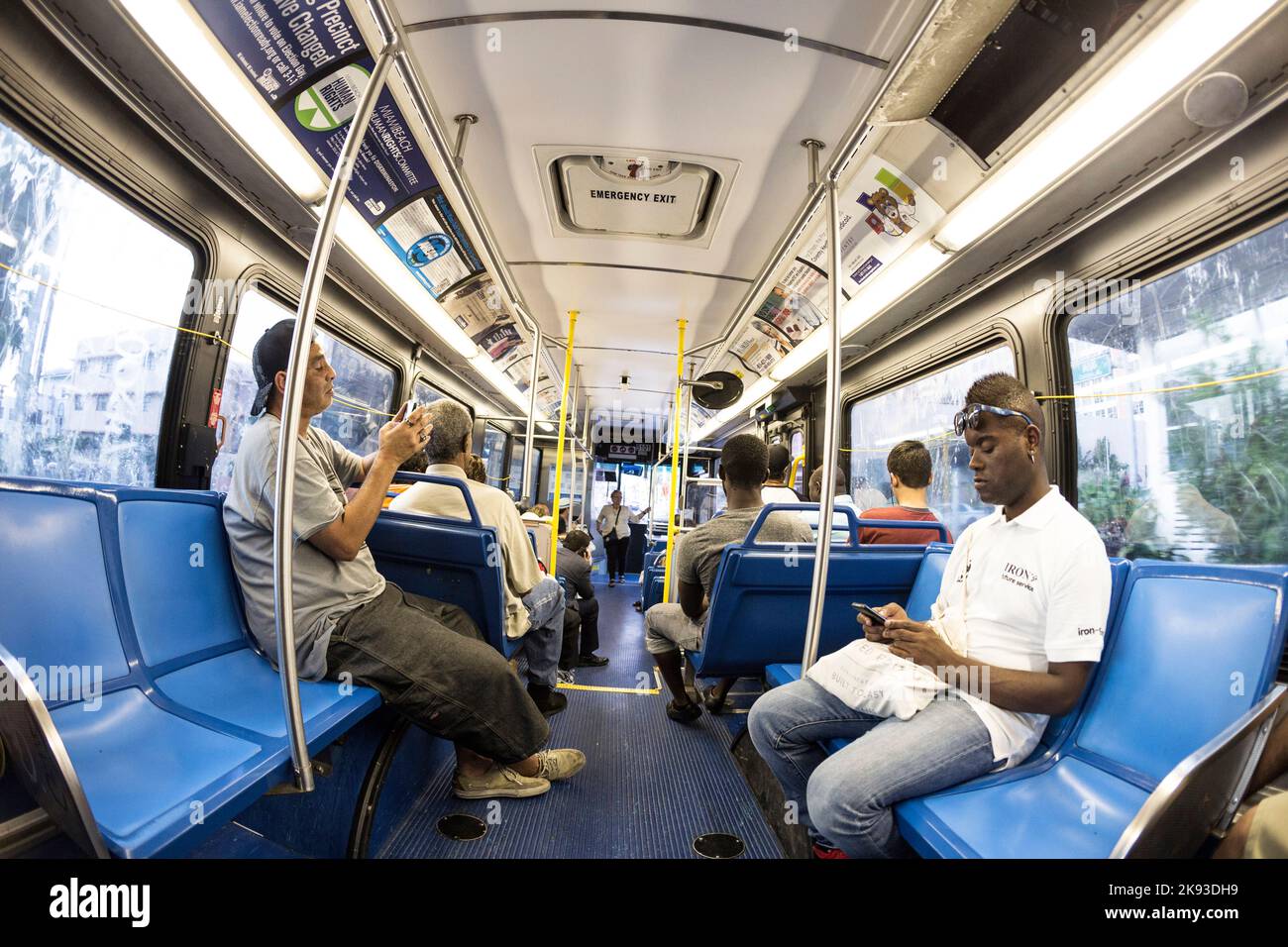 MIAMI, USA - AUG 18, 2014: people in the downtown Metro bus in Miami ...