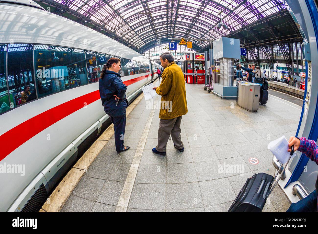 COLOGNE, GERMANY - SEP 7, 2014: people hurry to the intercity train in ...