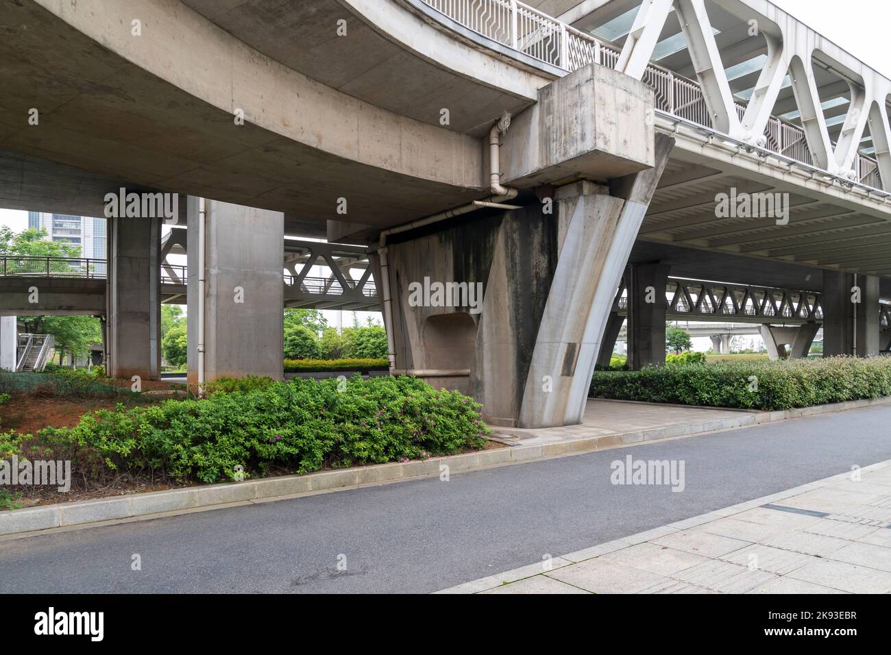 Concrete structure and asphalt road space under the overpass in the ...