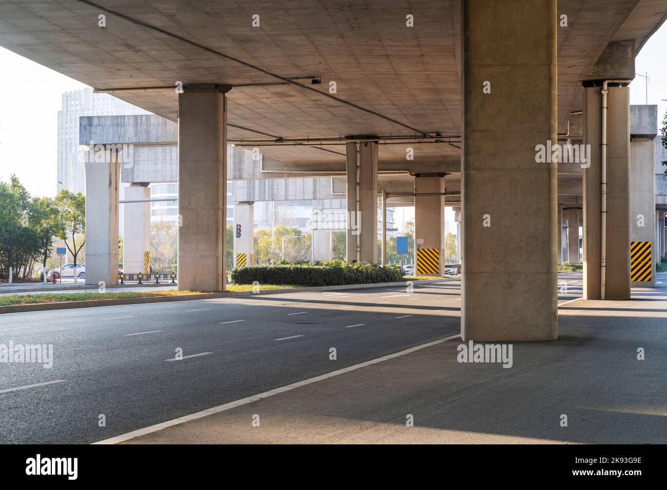 Concrete structure and asphalt road space under the overpass in the ...