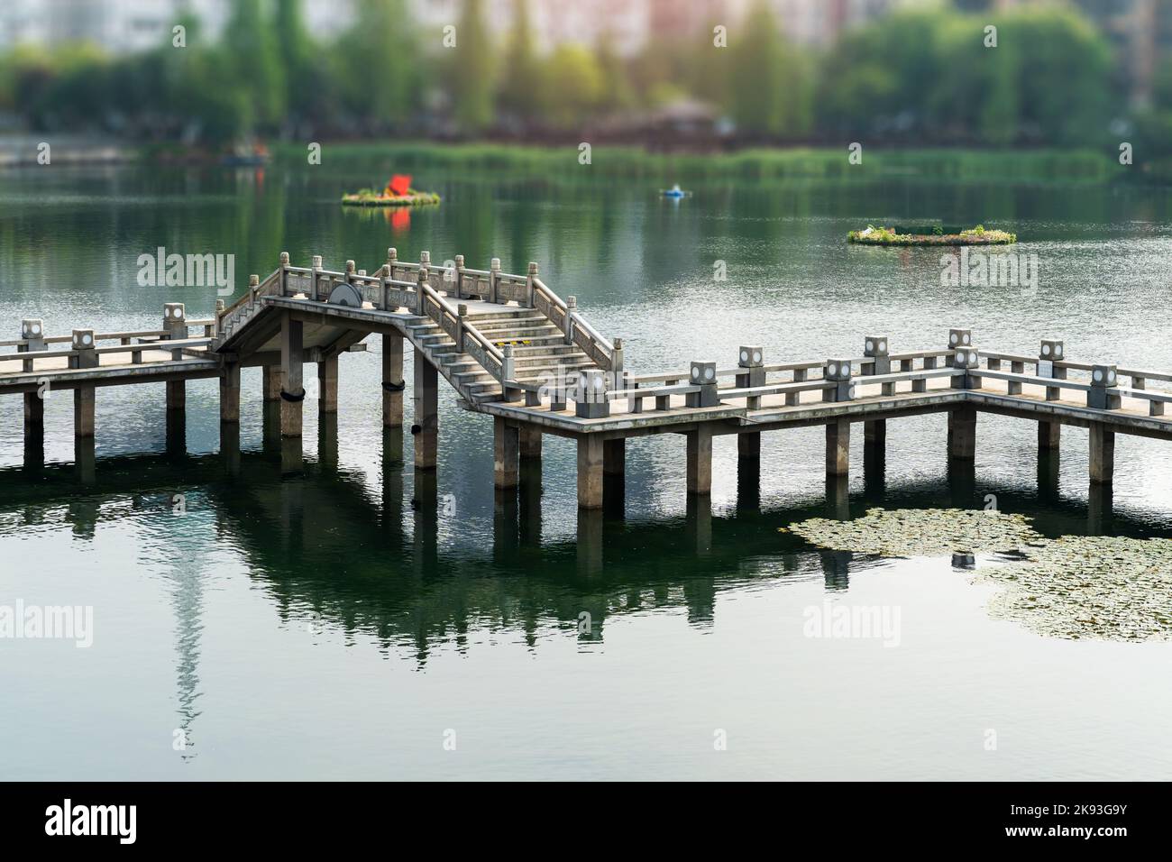 stone footbridge in an Asian garden Stock Photo - Alamy