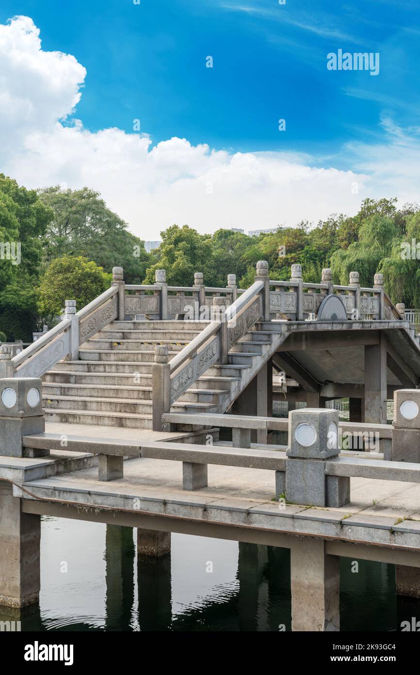 stone footbridge in an Asian garden Stock Photo - Alamy