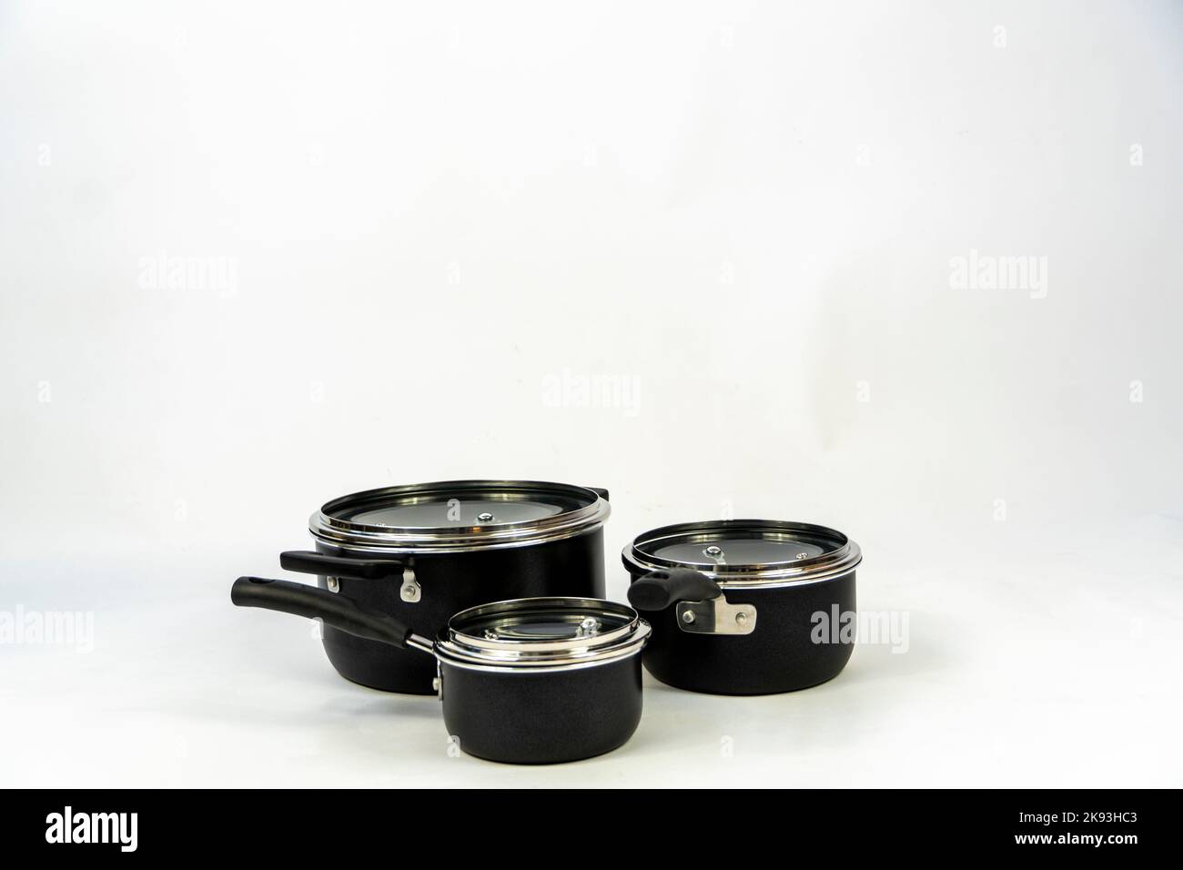 cookware set, steel dinner set isolated on white background, black ...