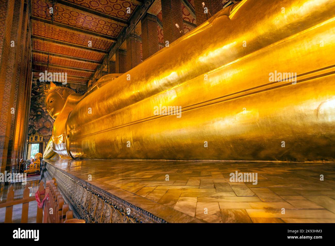 BANGKOK, THAILAND - JANUARY 4: Detail of the Reclining Buddha statue in temple Wat Pho in ...