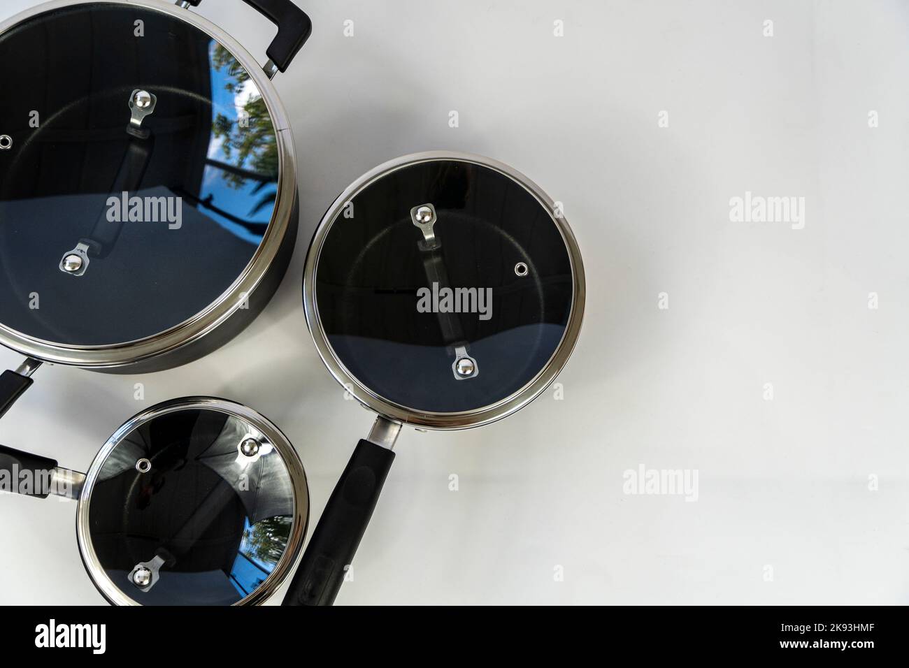 cookware set, steel dinner set isolated on white background, black ...