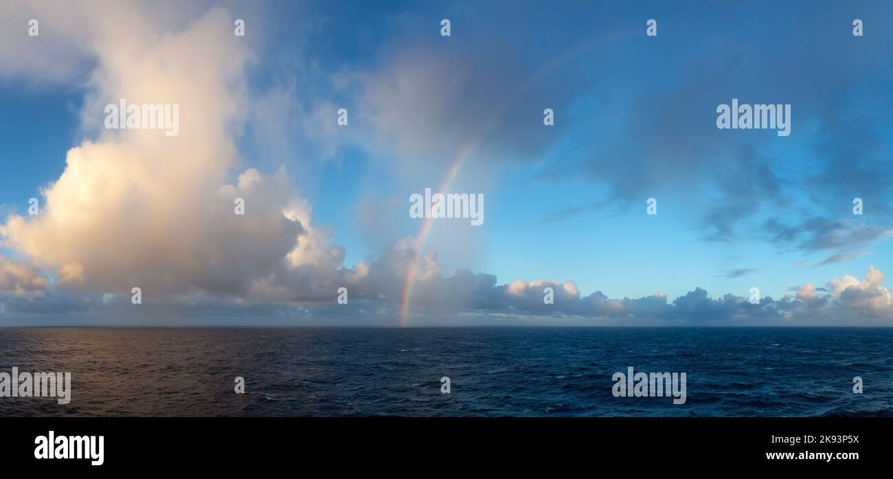 Dramatic Colorful Sunrise Sky over North Atlantic Ocean with Rainbow ...