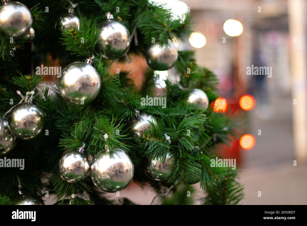 Christmas tree on the street as a background Stock Photo - Alamy