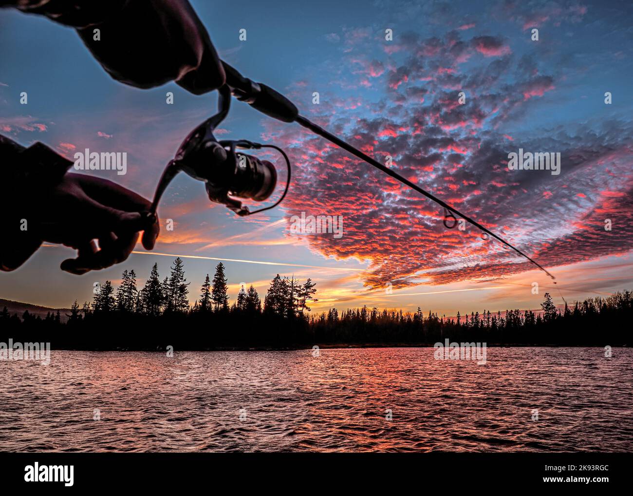 Fisherman fishing with a rod, fishing rod, Laurentides, Quebec, Canada ...