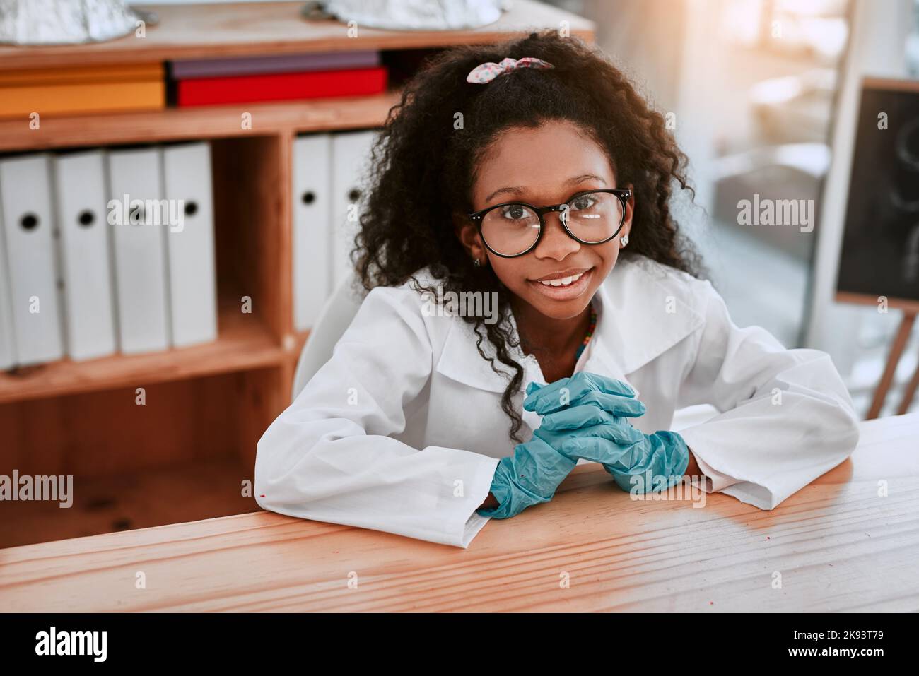 Her love for science started at an early age. Portrait of an adorable ...