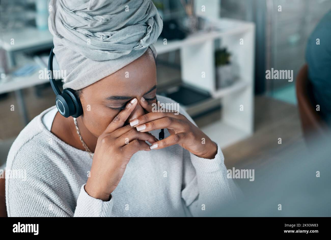 Customer service agent, stress and black woman with headache at work ...