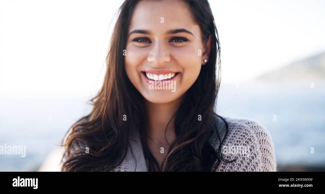 When you smile, the whole world smiles back at you. a beautiful young ...