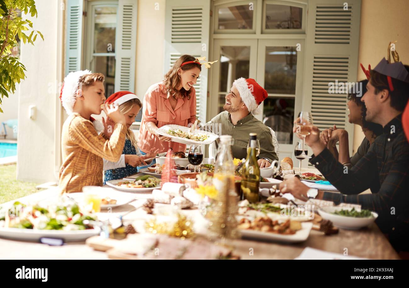 Spend Christmas with those you love. a happy family having Christmas ...