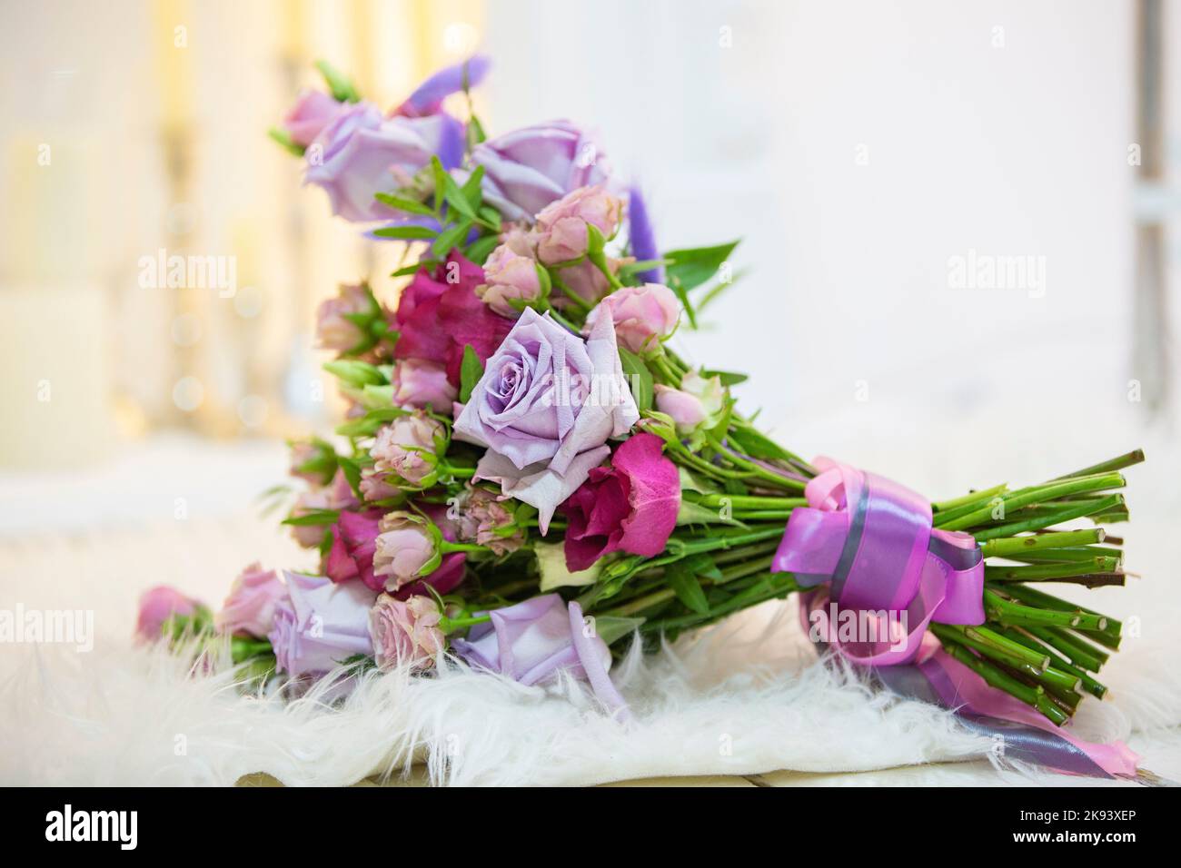 Bouquet of beautiful multi-colored roses on a light background ...