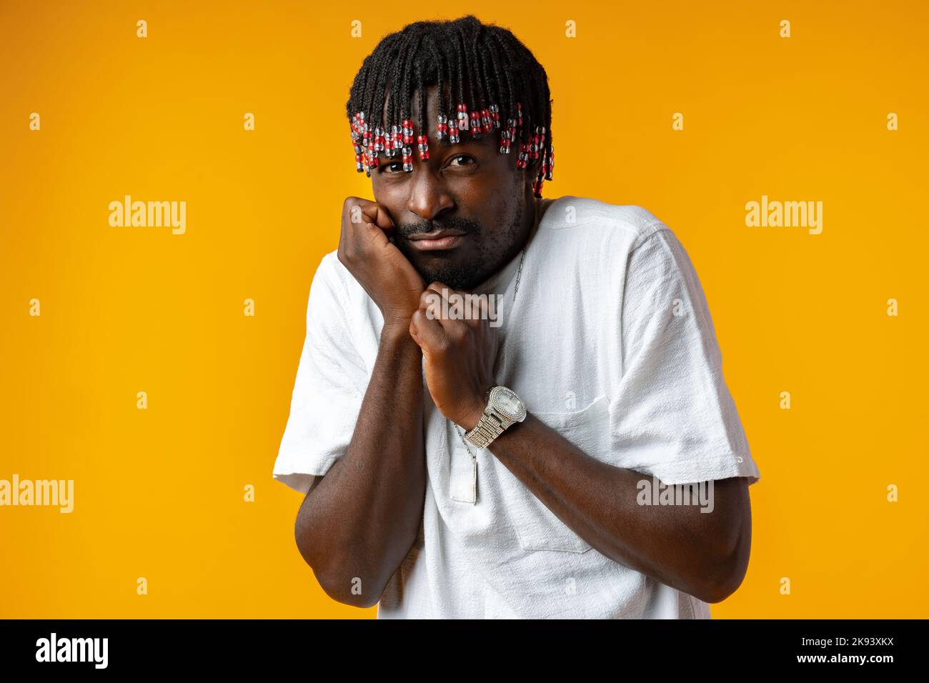 Scared african man face over yellow background Stock Photo - Alamy