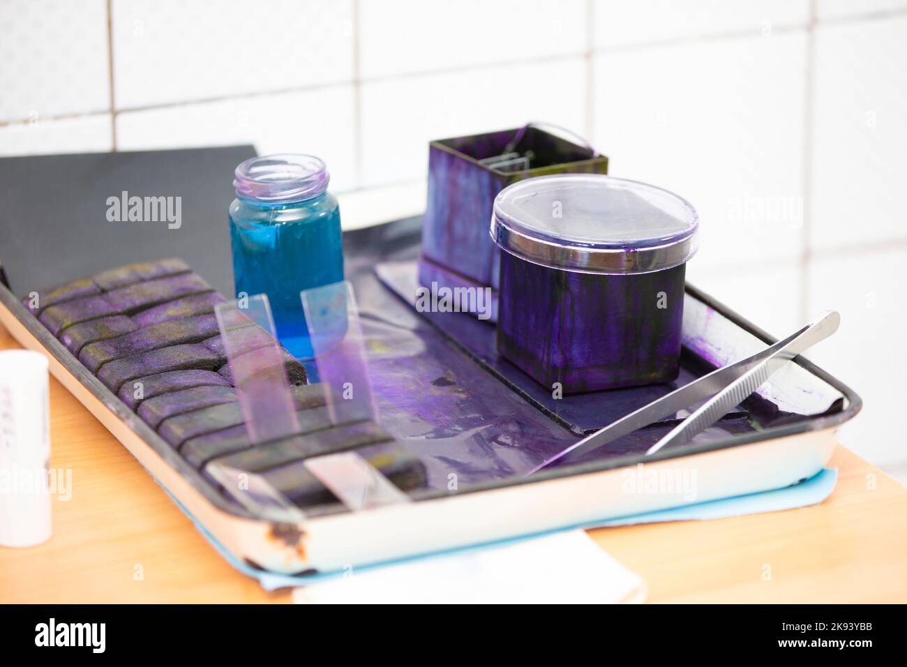 Hematoxylin and eosin solution. Blue solutions in a biochemical ...