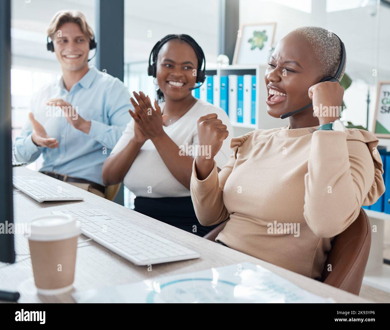 Celebration, call center and business people with success, achievement and goal in the office ...