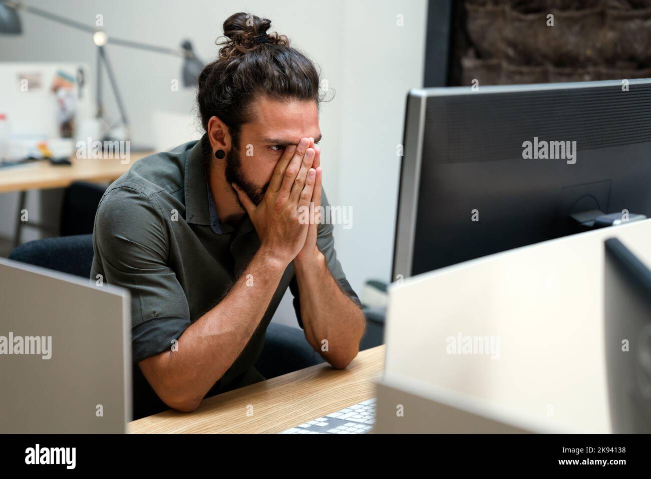 Tired businessman headache office hi-res stock photography and images ...