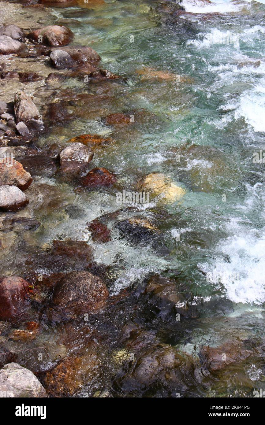 water sparkling around stones Stock Photo - Alamy