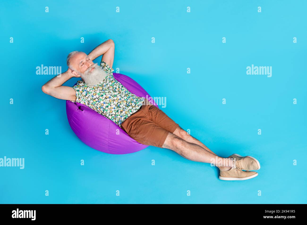 Old man sunbathing on beach hi-res stock photography and images - Alamy