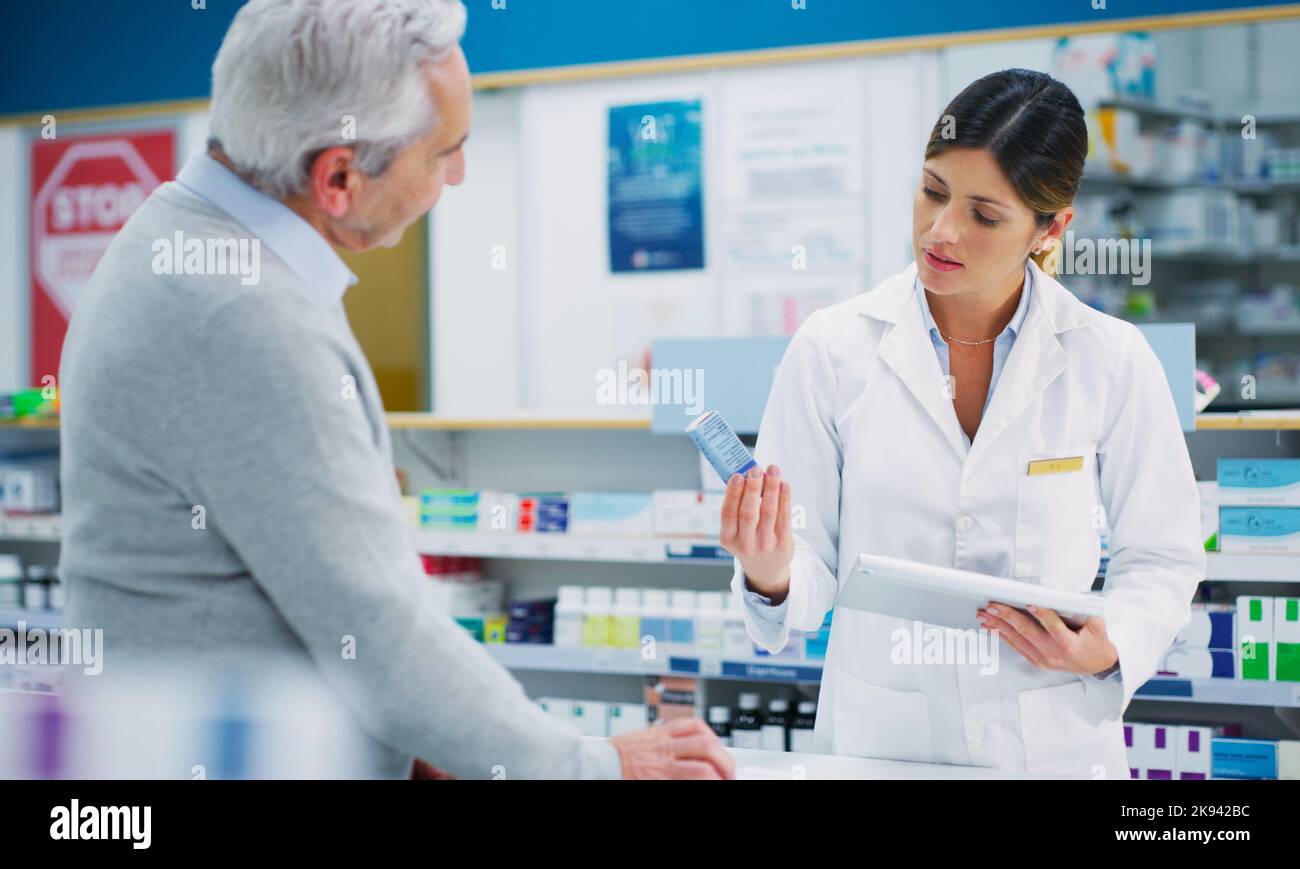 This is the one thatll be the most effective. a pharmacist assisting a ...