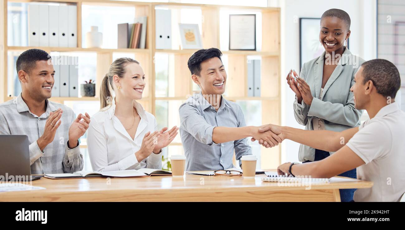 Handshake, applause and congratulations, recruitment success at startup ...