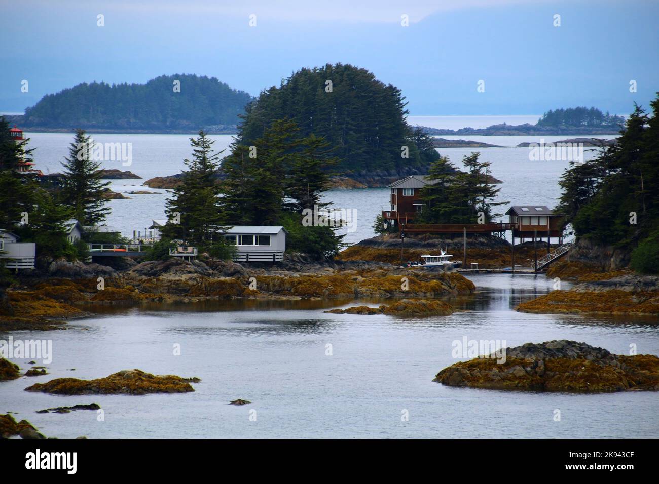 Alaska, small vegetated island in Sitka Sound Stock Photo - Alamy