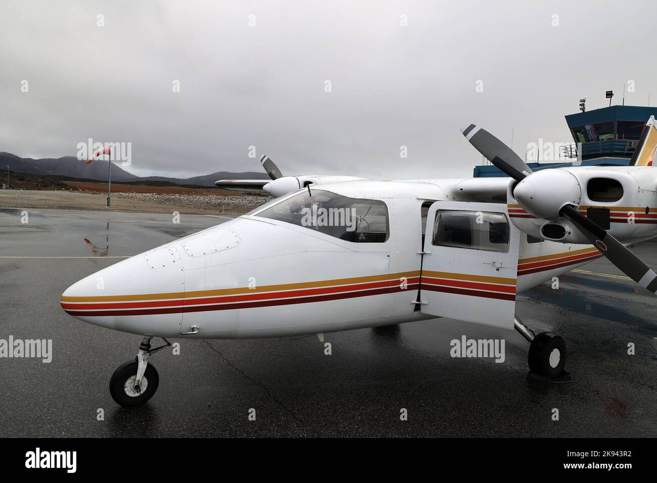 Small propeller aircraft at Ilulissat Airport, Greenland Stock Photo ...