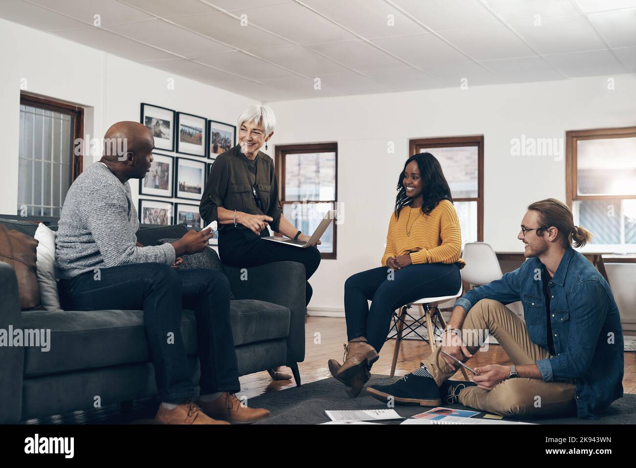 Trust us to come up with a plan. a group of designers have a discussion ...