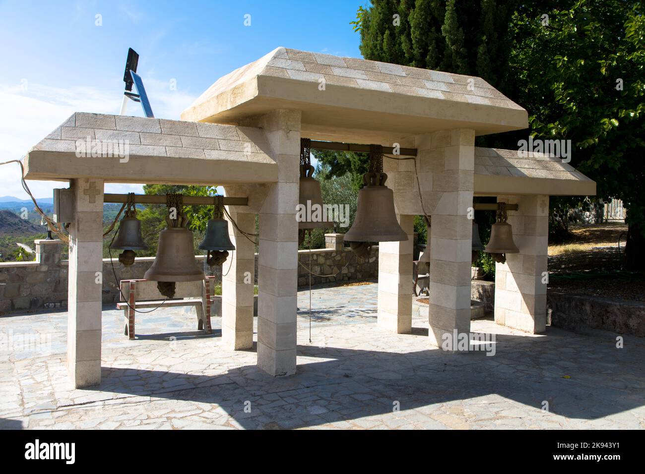 Bronce bells hangs in front of the Moni Thari monastery. The monastery ...