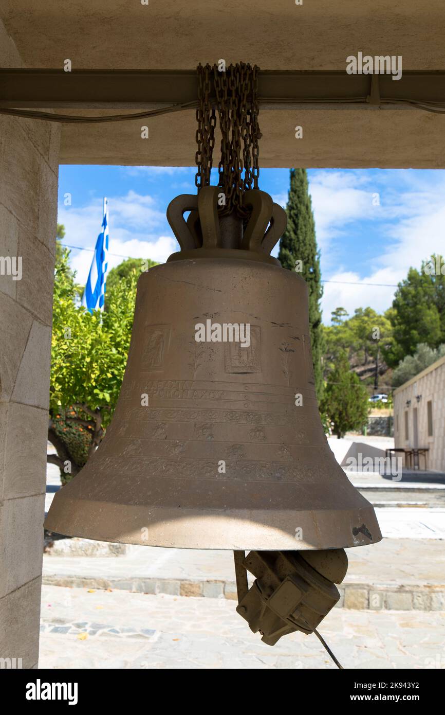 Bronce bells hangs in front of the Moni Thari monastery. The monastery ...
