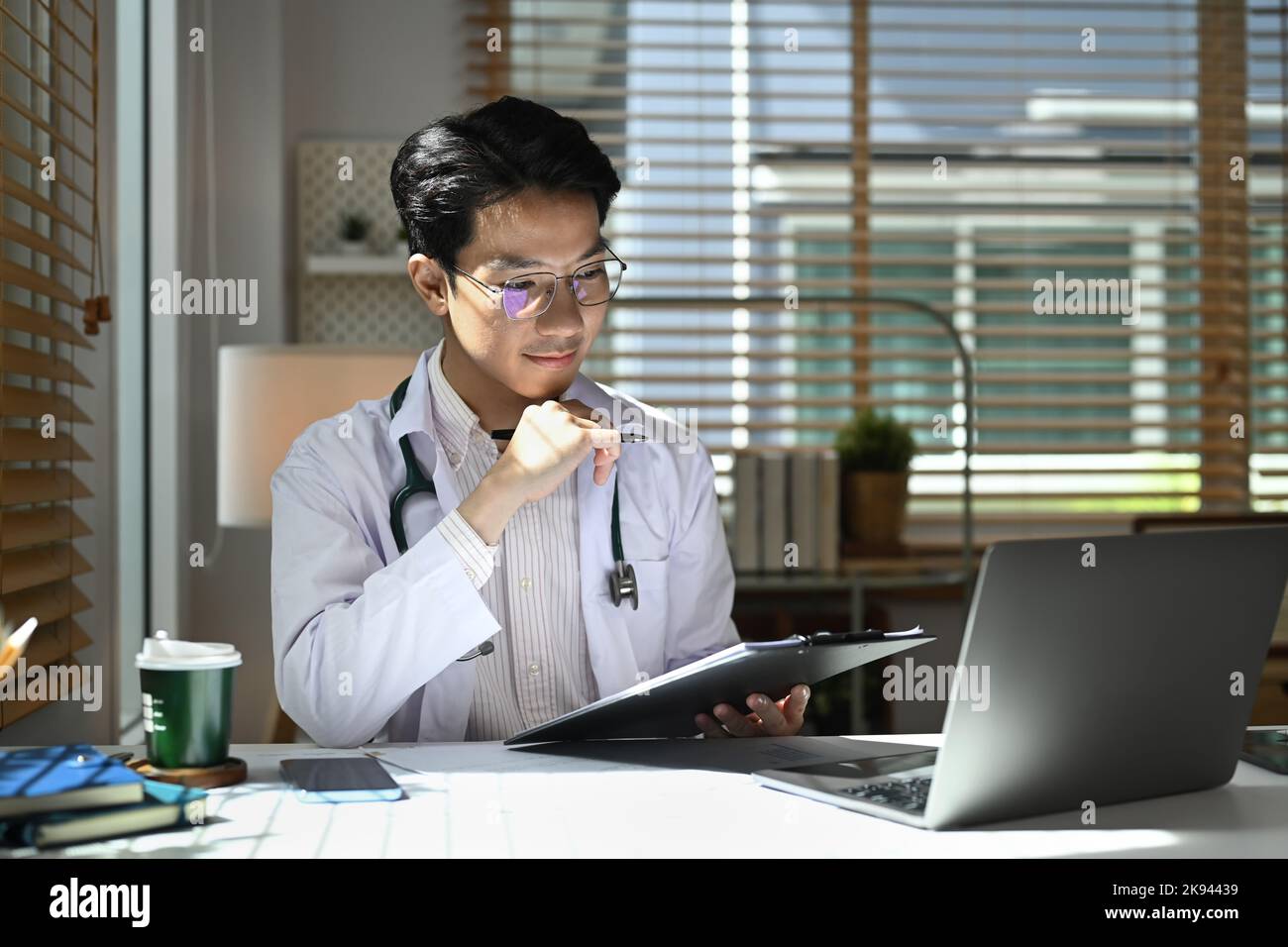 Doctor consultation typing notes hi-res stock photography and images ...