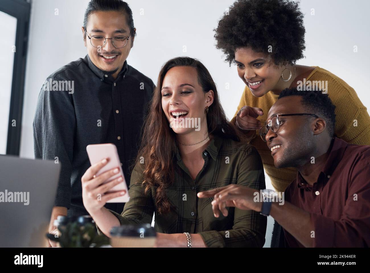 Where would we be without technology. a diverse group of businesspeople ...