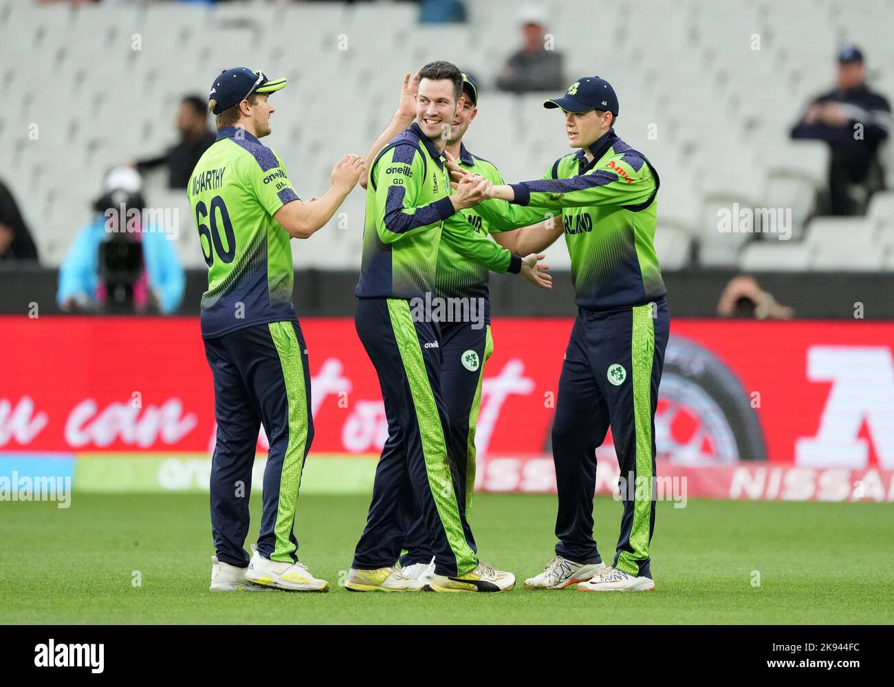 Ireland's George Dockrell (centre) celebrates following the dismissal ...