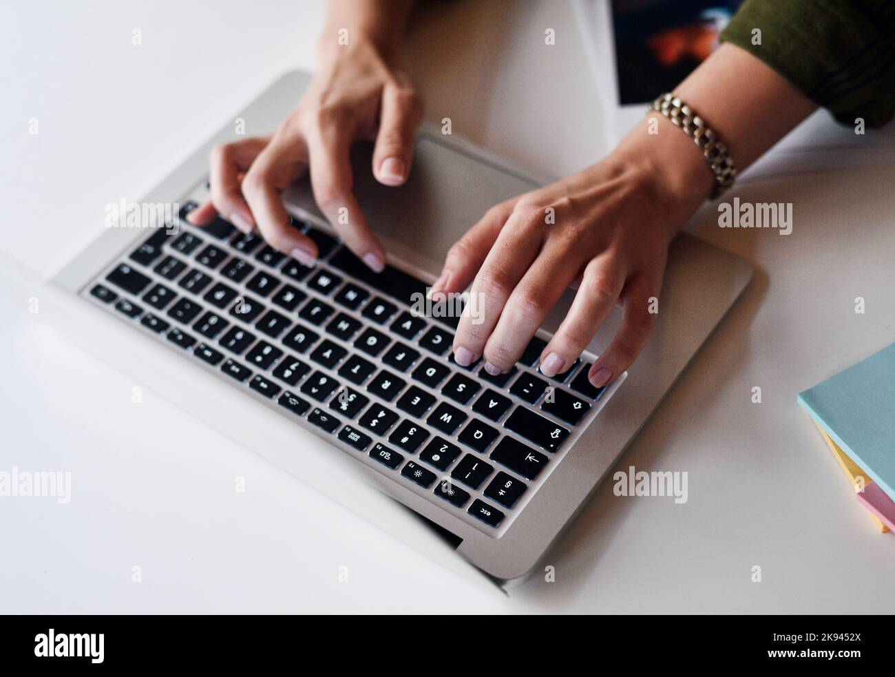 Speed typing is essential in my job. an unrecognizable businesswoman ...