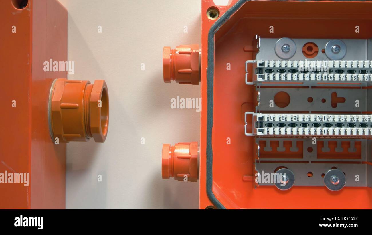 Red electric control box on white background. Industrial fuse box. Blur ...