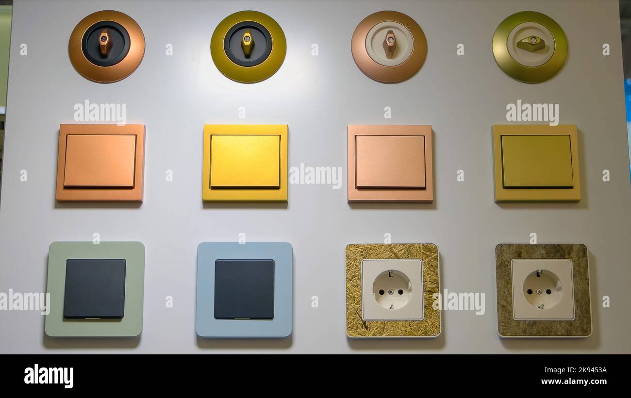 Close-up various sockets and switches on the white wall. Electrical ...