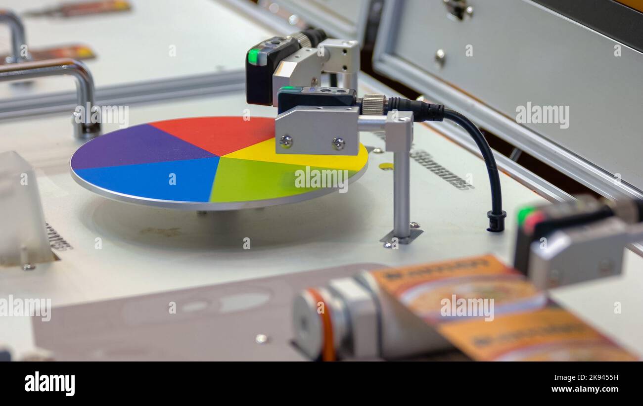 Polygraphy printing concept. Rotating wheel palette. Working machinery ...