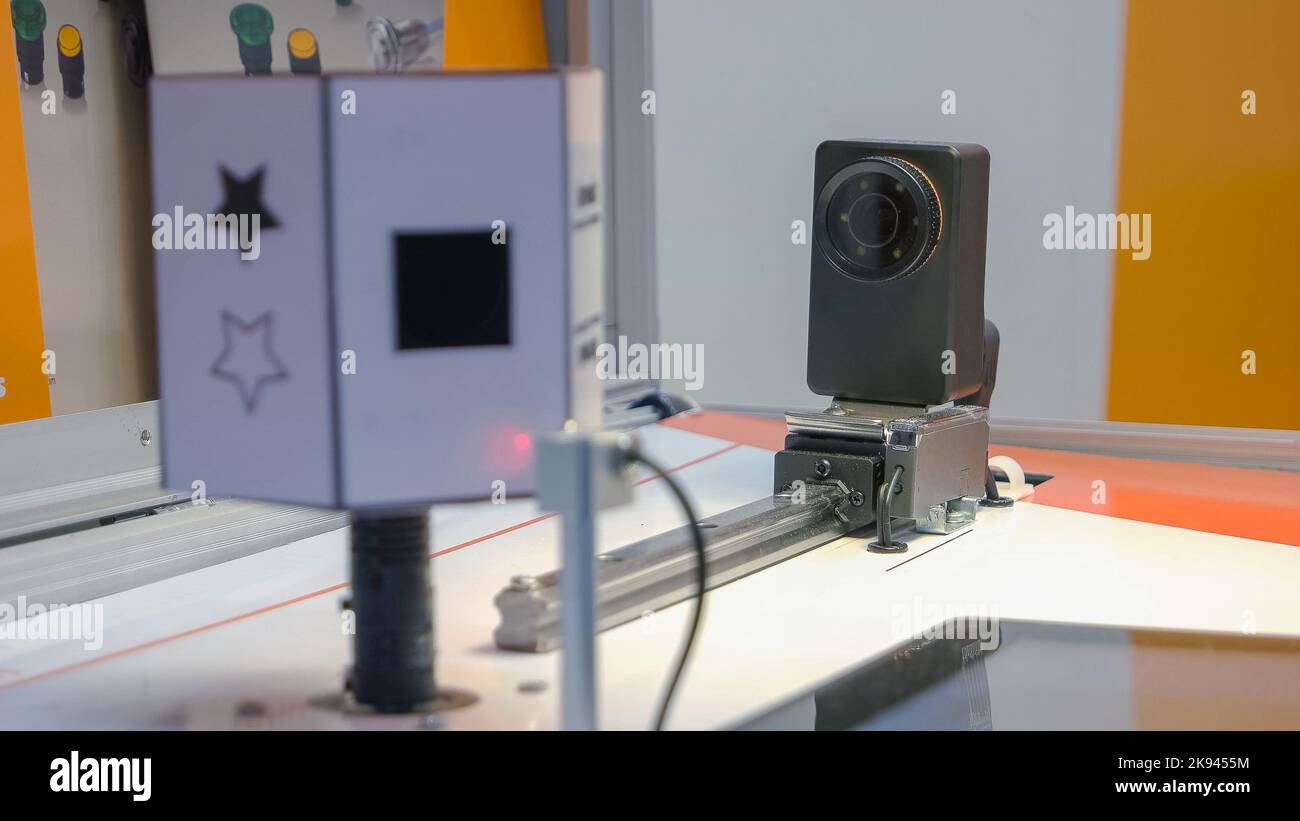 Close-up blinking autonics relay and rotating element. Manufacturing ...